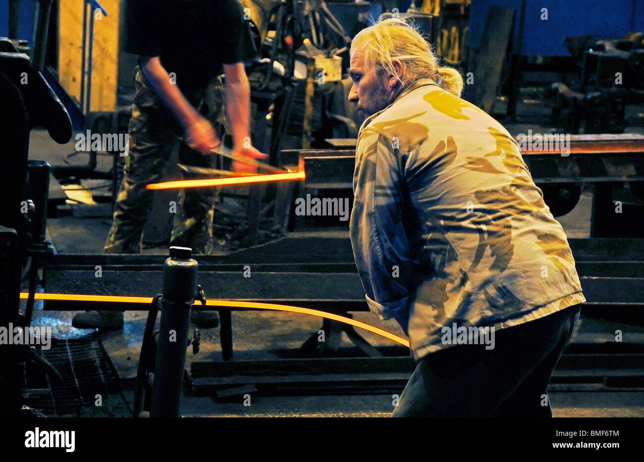 Bill Pinchers feeding strip steel through the mill at John Legg’s in ...