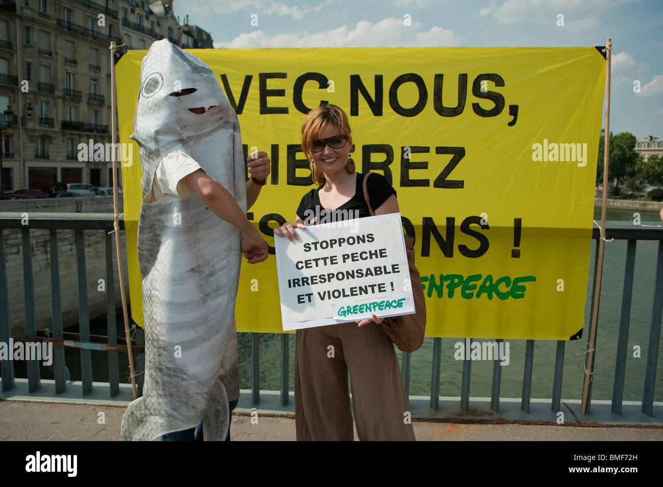 Woman holding Protest Sign, Environmental Activists from Greenpeace ...