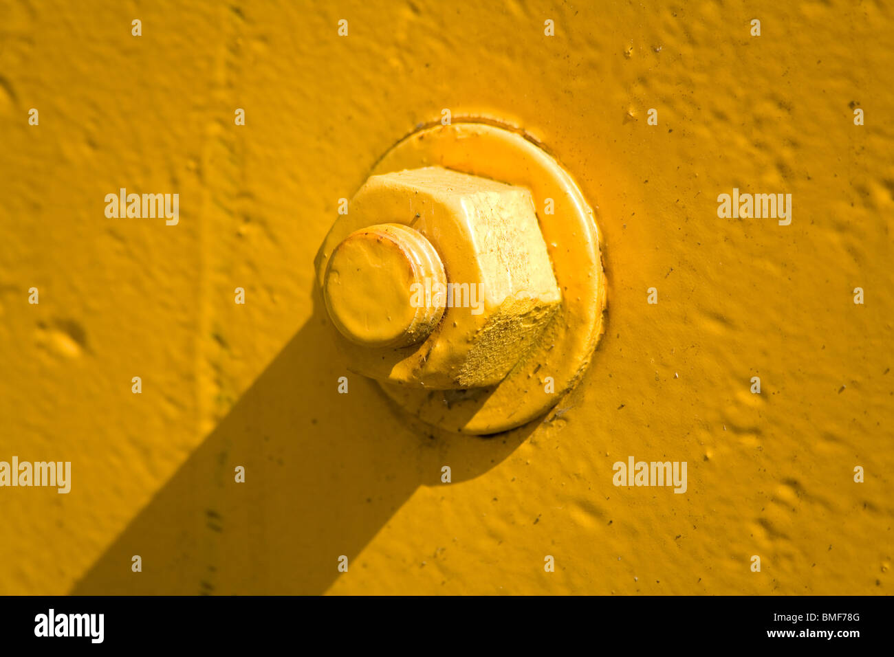 Yellow screw close up shot Stock Photo - Alamy