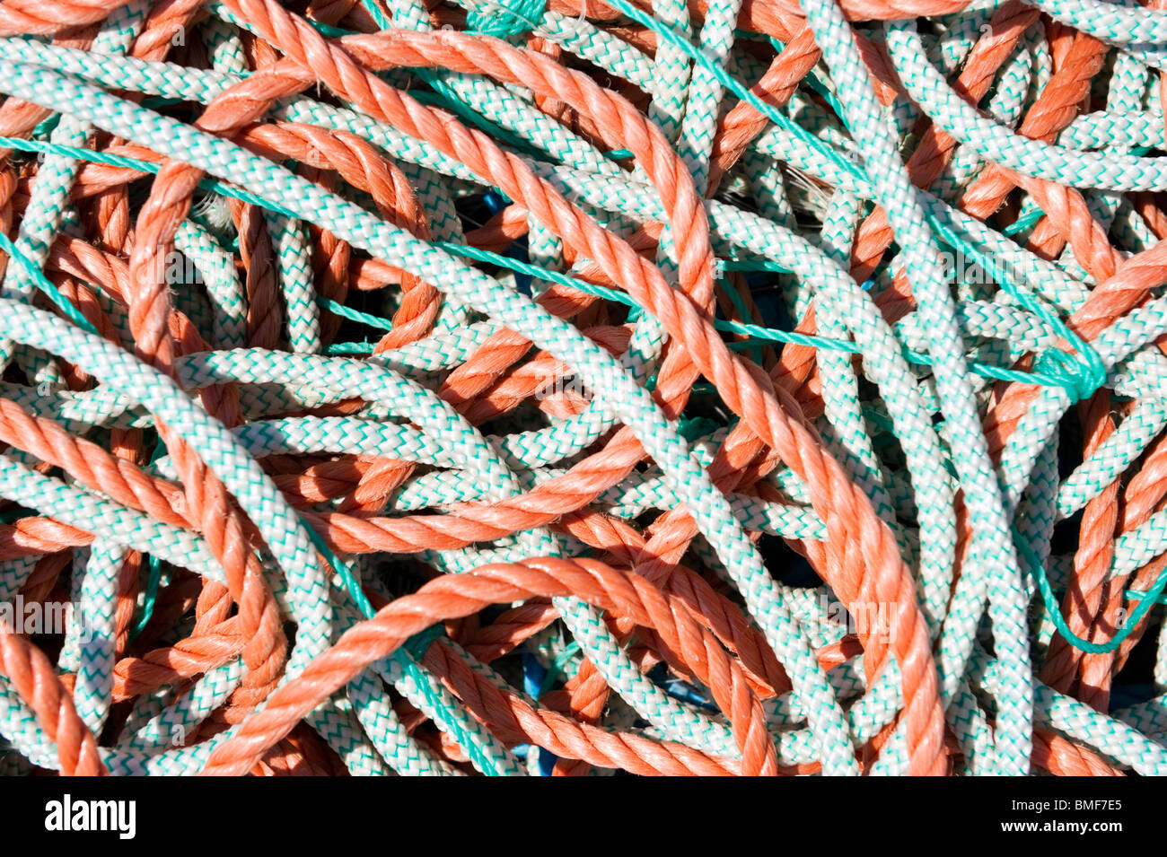 A pile of nylon ropes on the beach at Shoreham harbour Sussex UK Stock ...