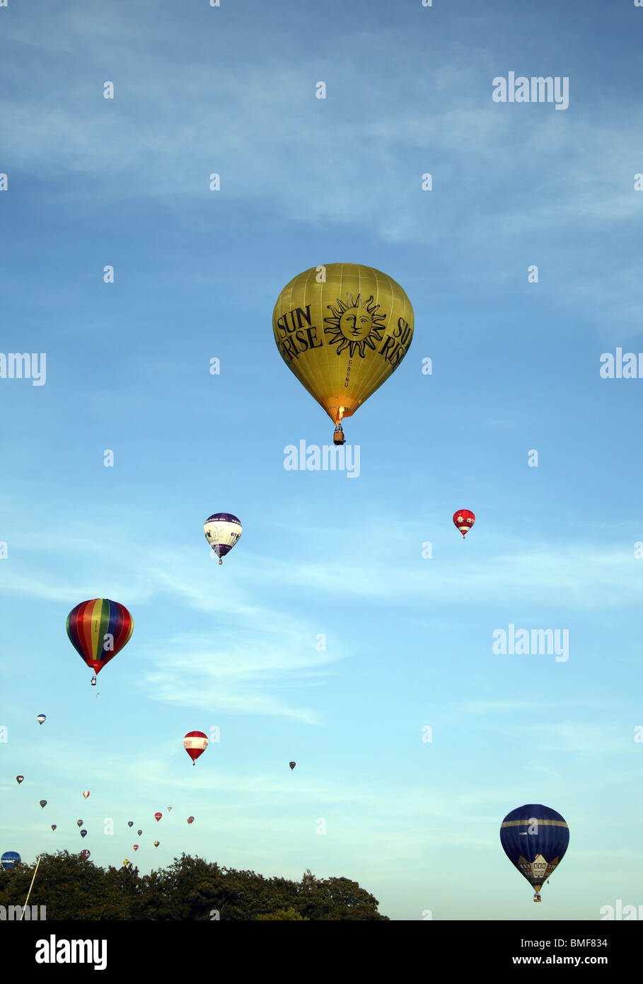 Hot air balloons mass launch Stock Photo - Alamy