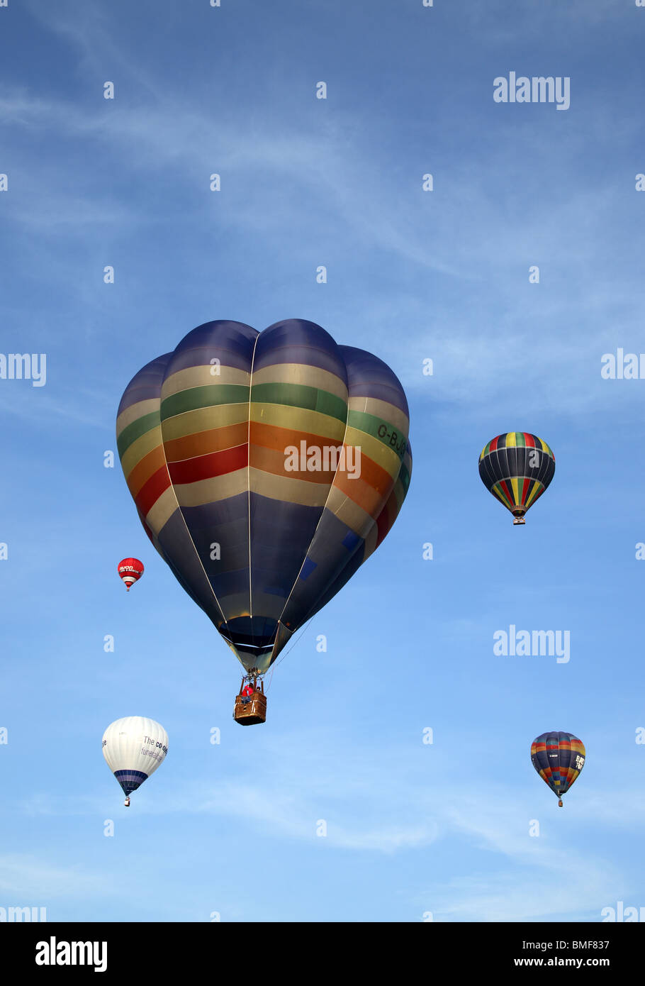 Hot air balloons mass launch Stock Photo - Alamy
