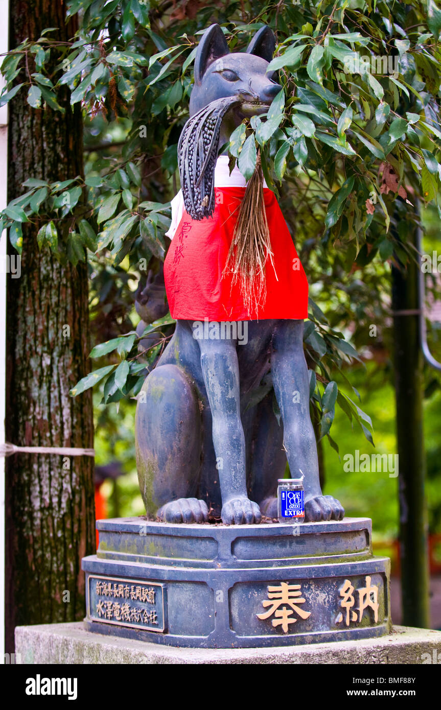 Fox statue in Japanese shrine in Kyoto Japan Stock Photo - Alamy