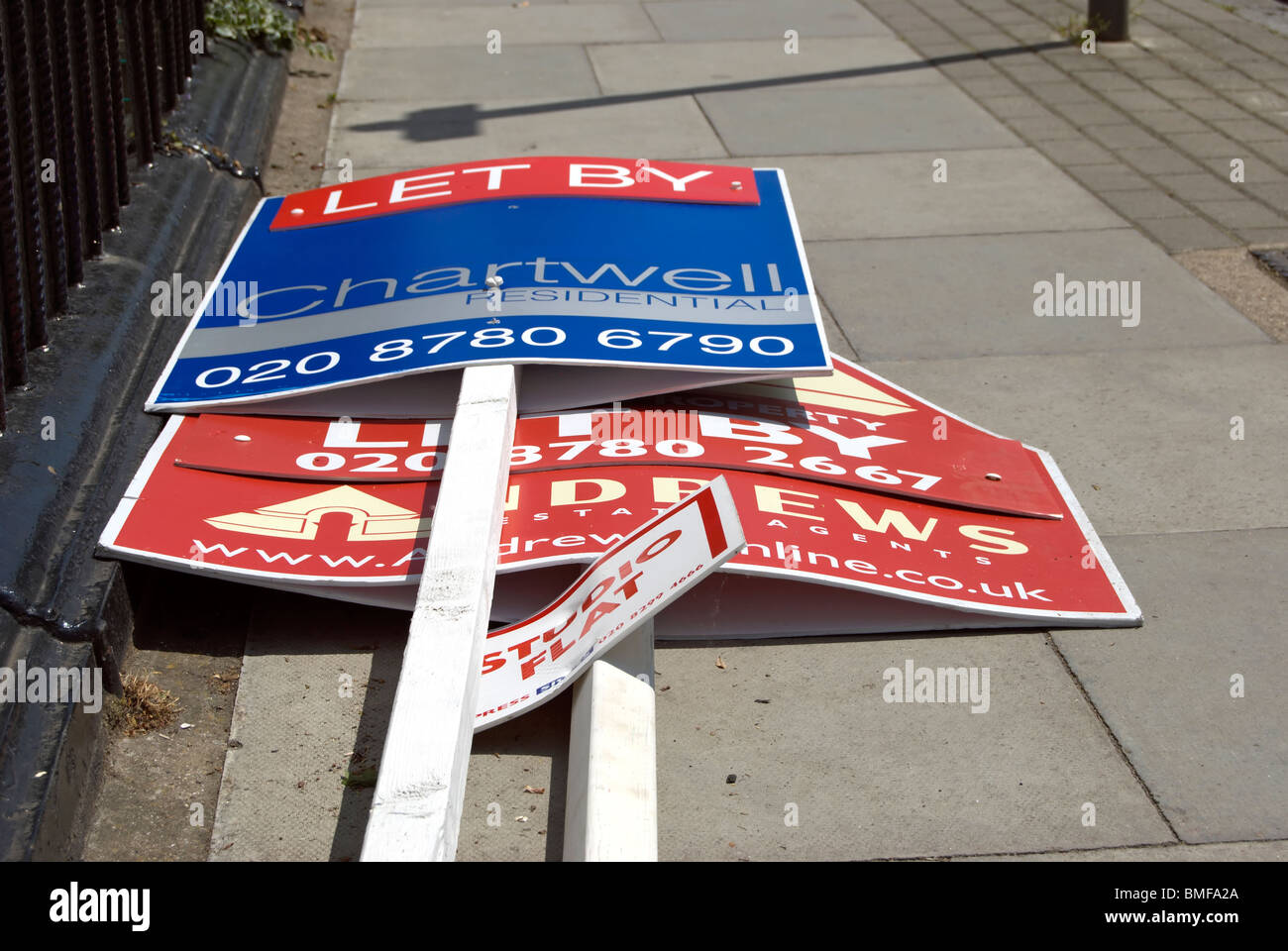 to let signs laying on a pavement in putney, southwest london, england ...