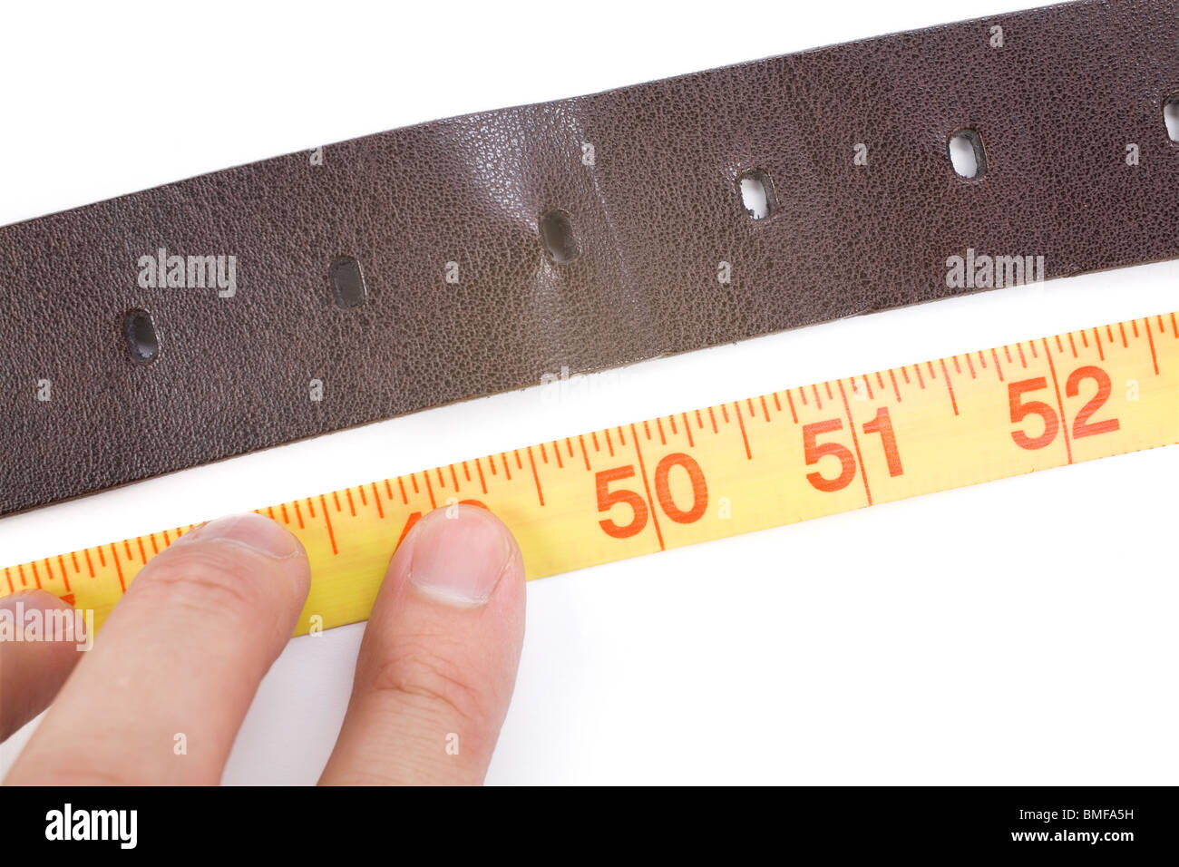 ruler and belt, concept of weight loss Stock Photo - Alamy