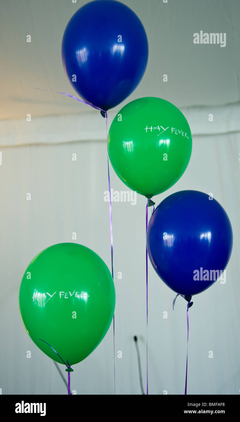 Four inflated green and blue balloons Stock Photo - Alamy