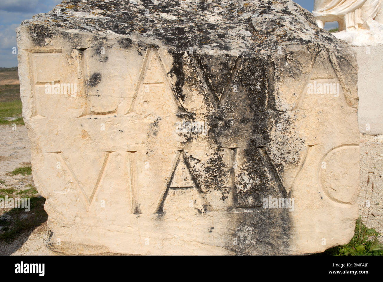 latin inscription carved in stone, Roman ruins of Segobriga, near ...
