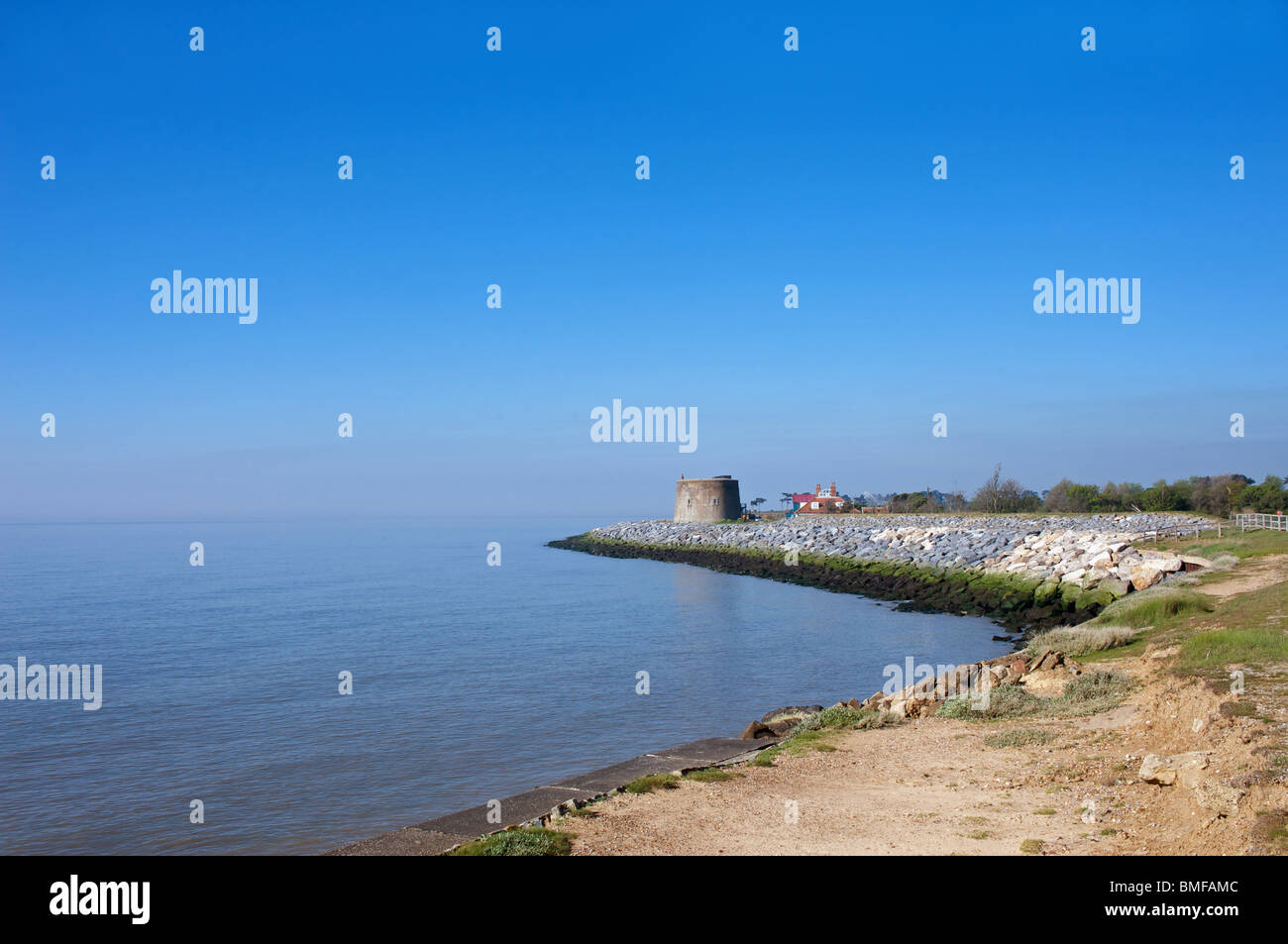 Rock armor protecting a historic Martello tower from coastal erosion ...