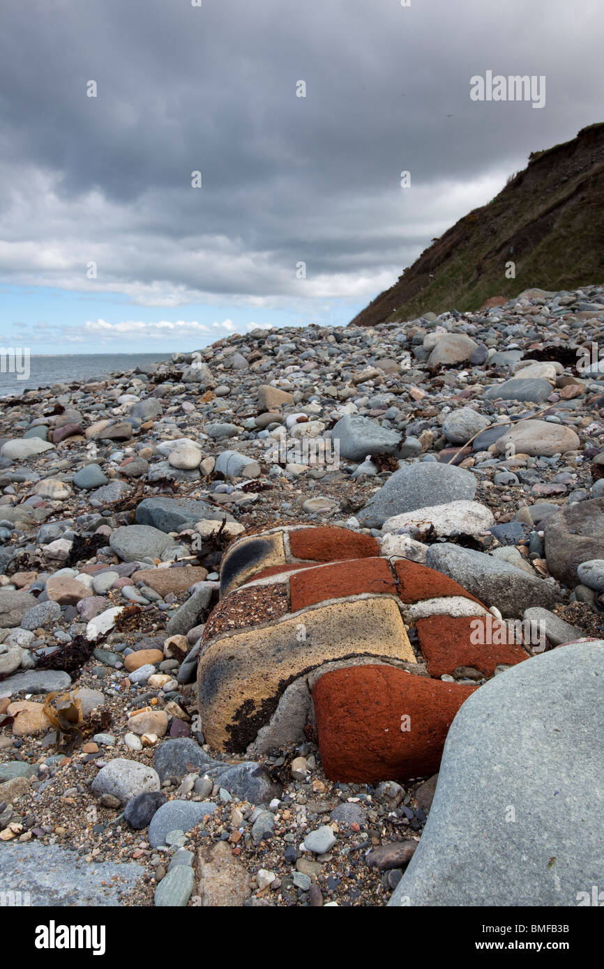 eroded bricks lying on beach Stock Photo - Alamy