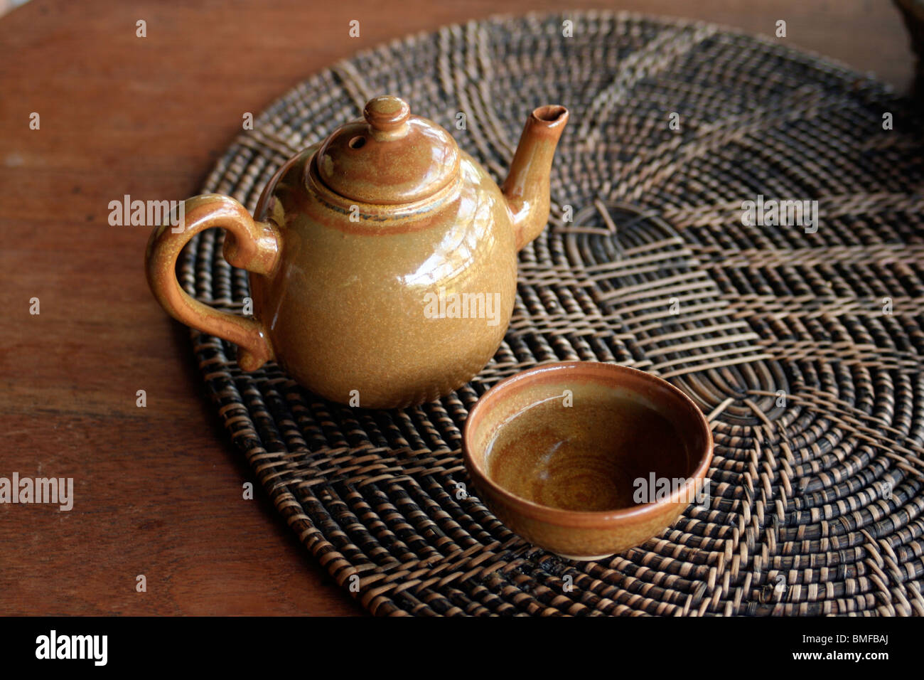 Tea pot and cup on wicker tray in Thailand, Asia Stock Photo - Alamy