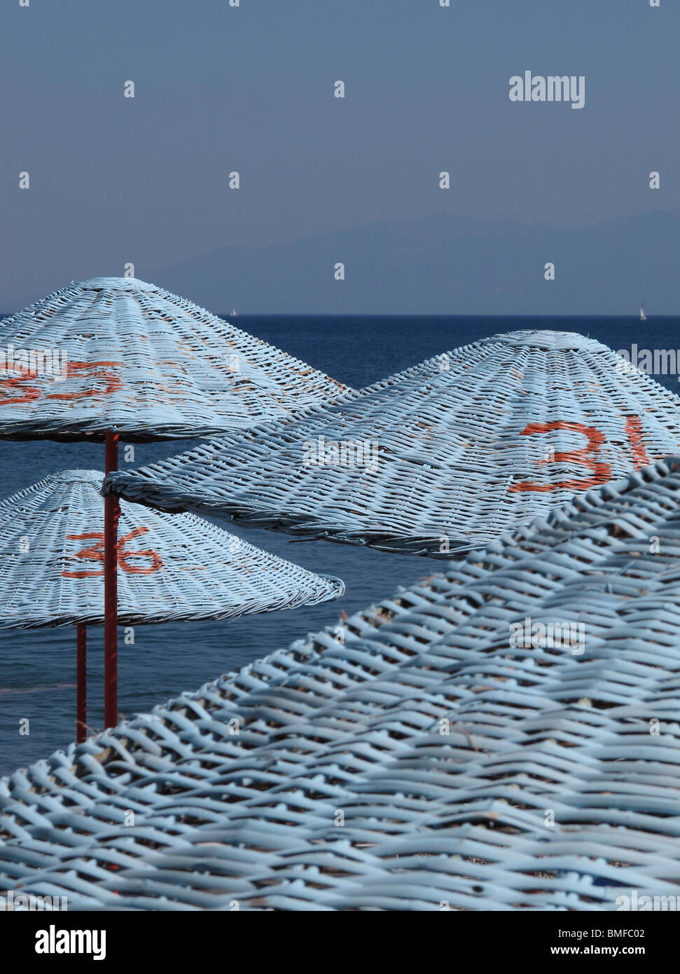 colorful sun umbrellas at the beach of Mediterranean sea Stock Photo ...