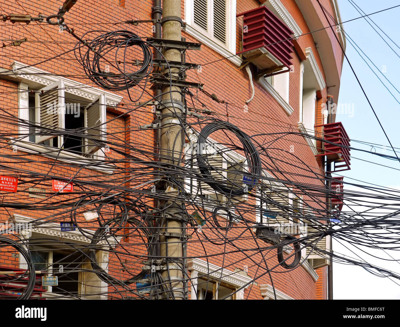 Telegraph pole with bunch of cables in Shanghai, China Stock Photo - Alamy