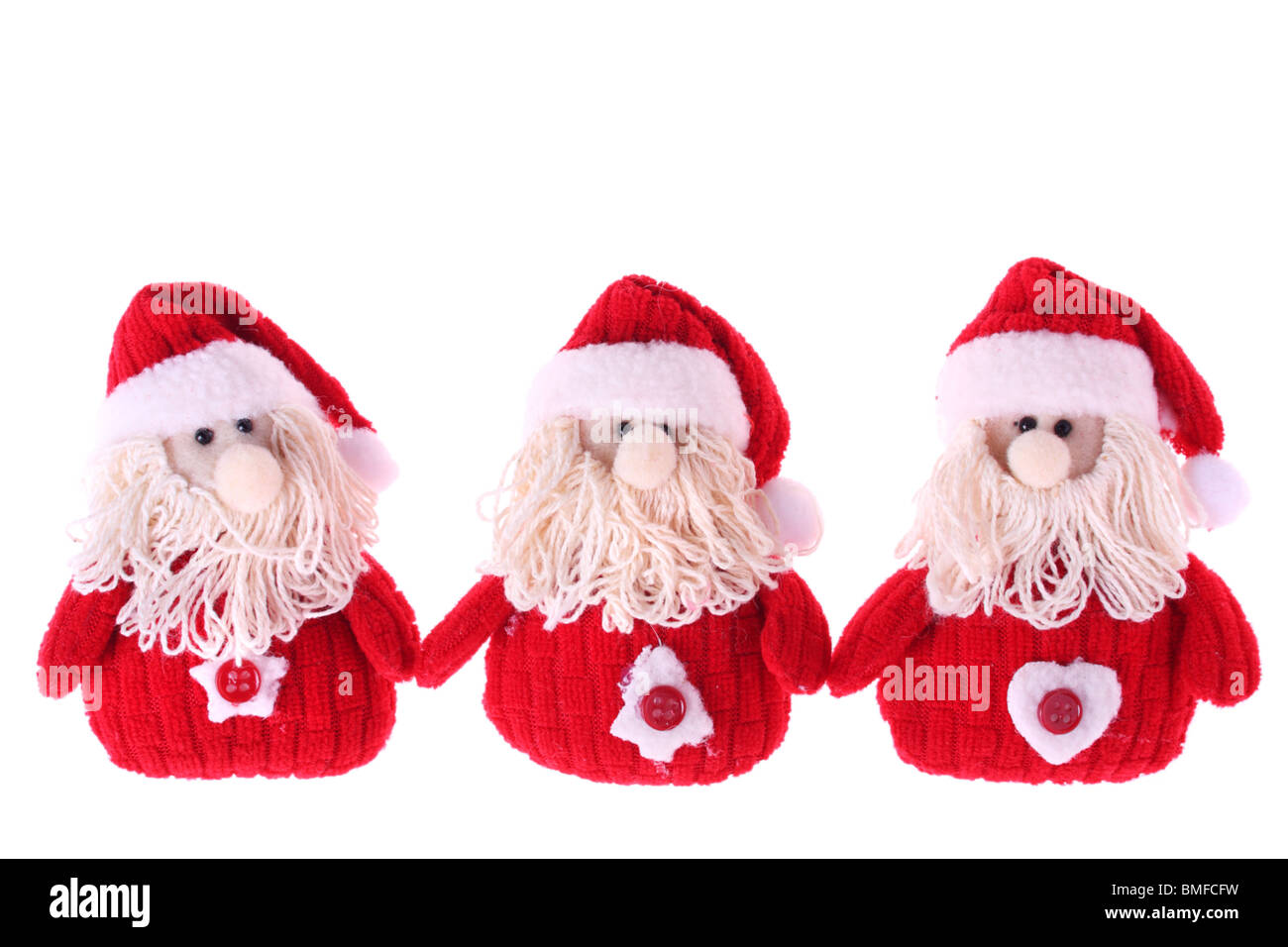 Three Santa Clauses isolated on white background Stock Photo - Alamy