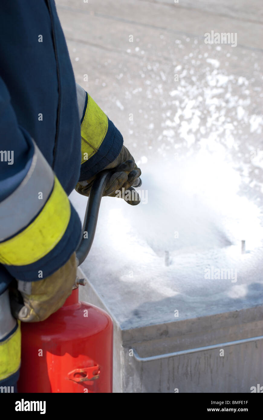 Extinguishing a fire Stock Photo - Alamy
