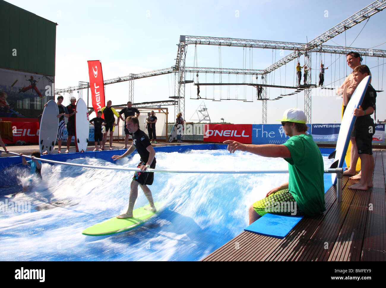 The Wave, an artificial surf wave in a pool. People learn to surf, good ...