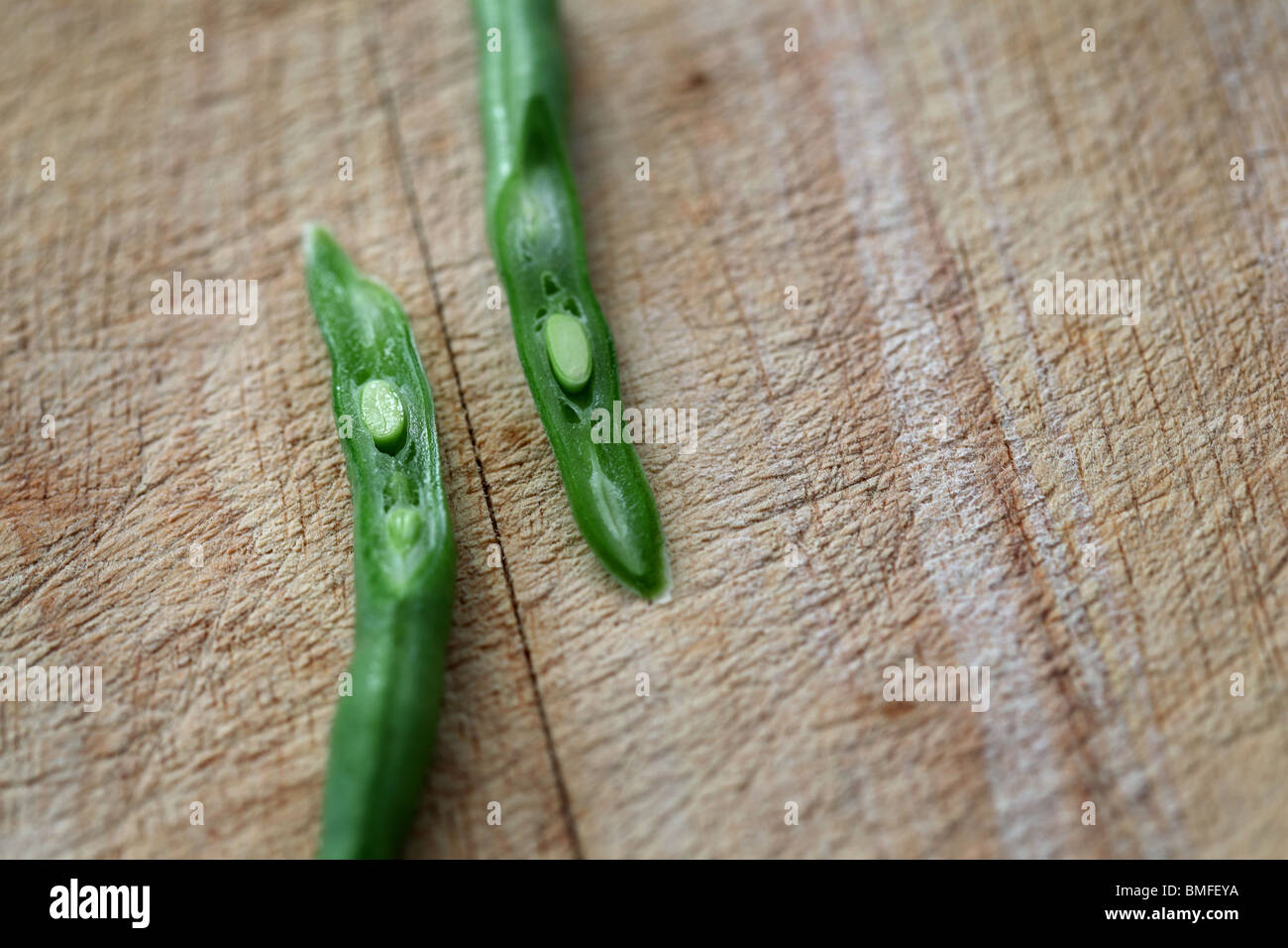 green beans wooden chopping board Stock Photo - Alamy