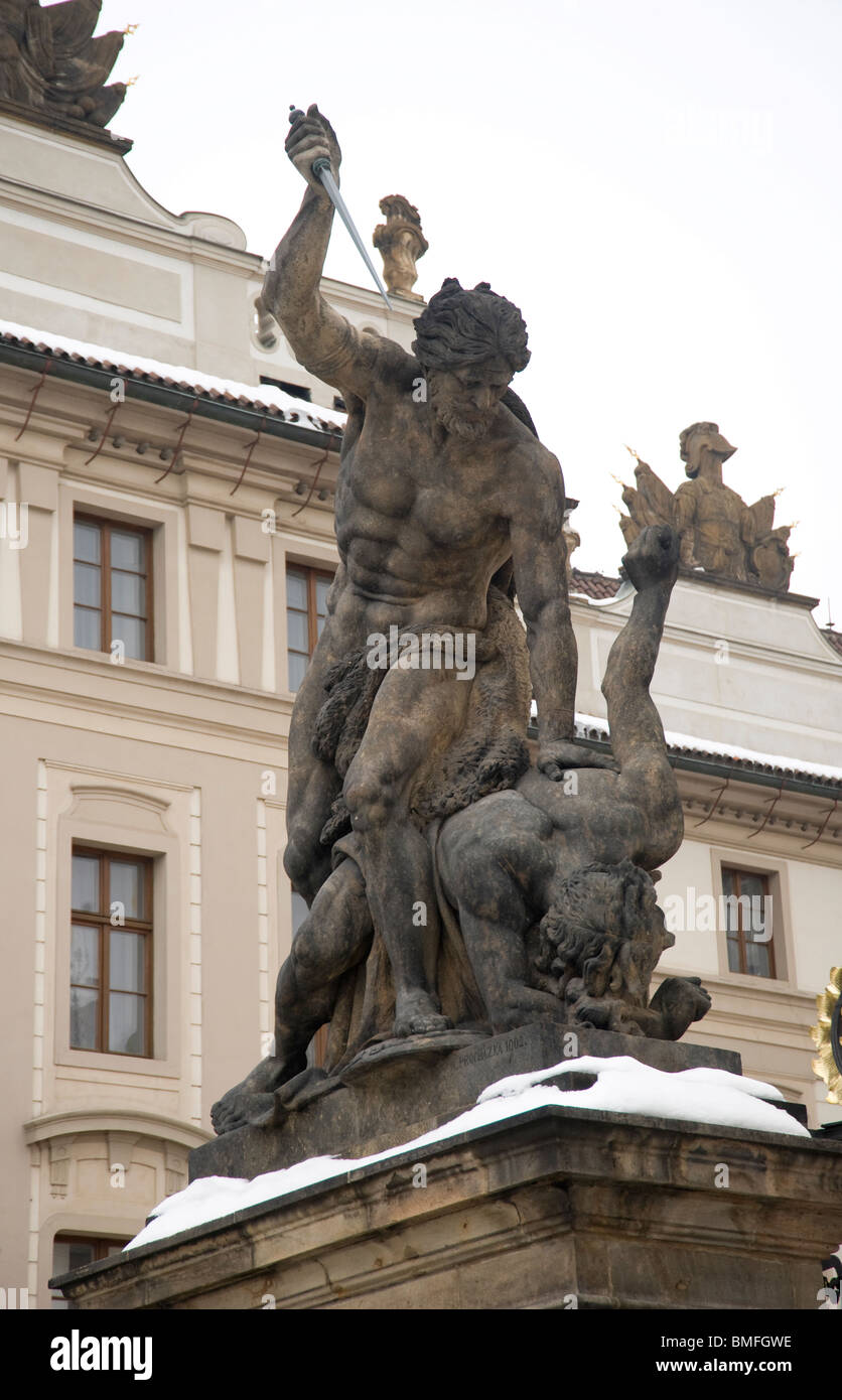 Statue on the gates of Prague Castle depicting a violent scene Stock ...