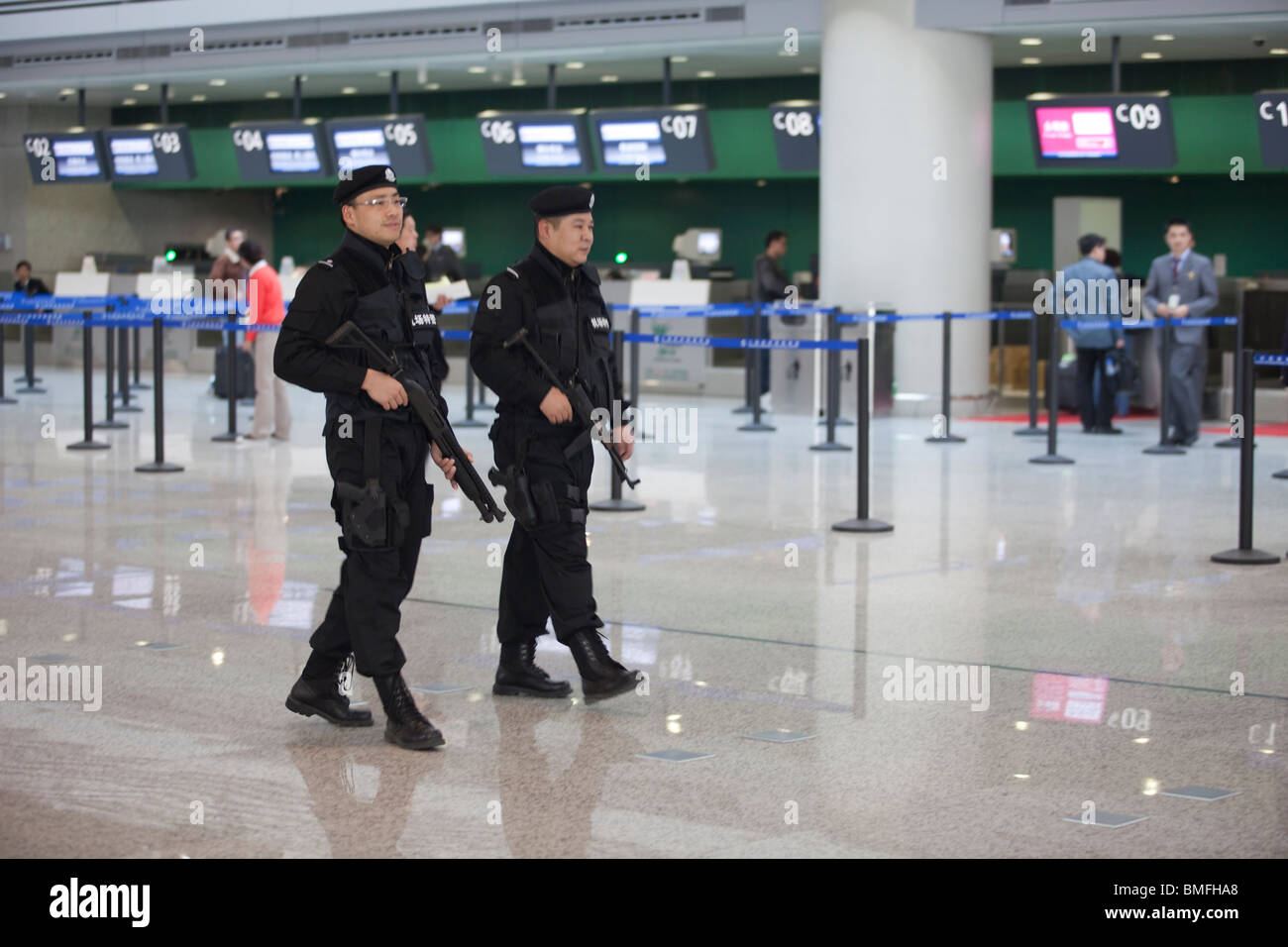 Armed policemen patrolling Shanghai Hongqiao International Airport ...