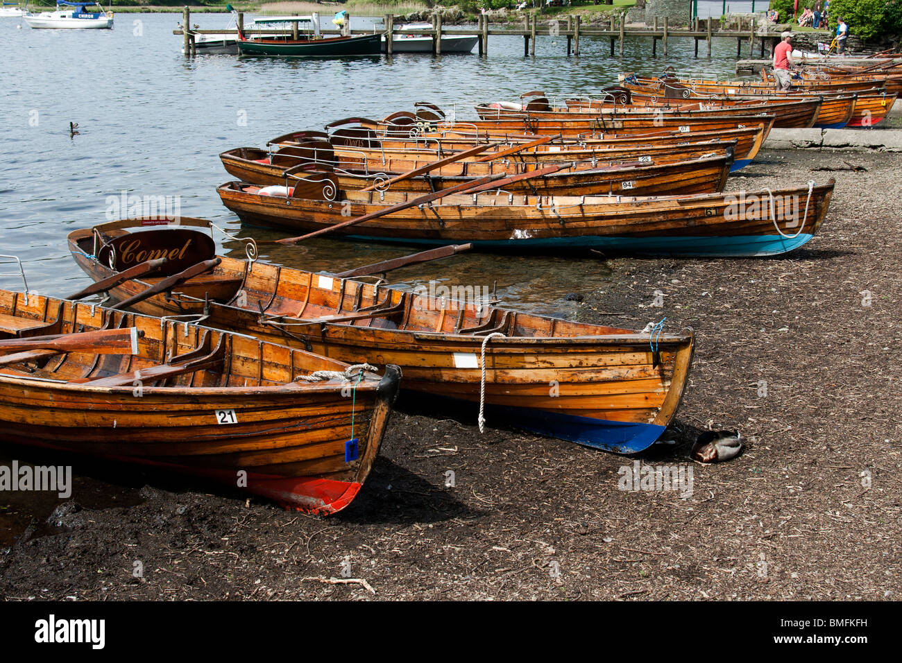 Wooden rowing boats on the shores of Lake Windermere in the Lake ...