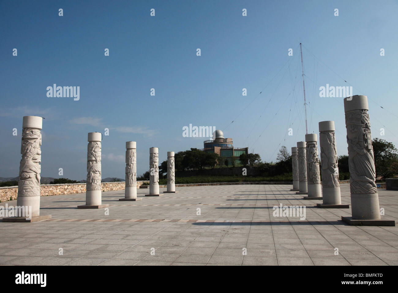Decorative columns carved with ancient legendery heros, Qiyuan Square ...