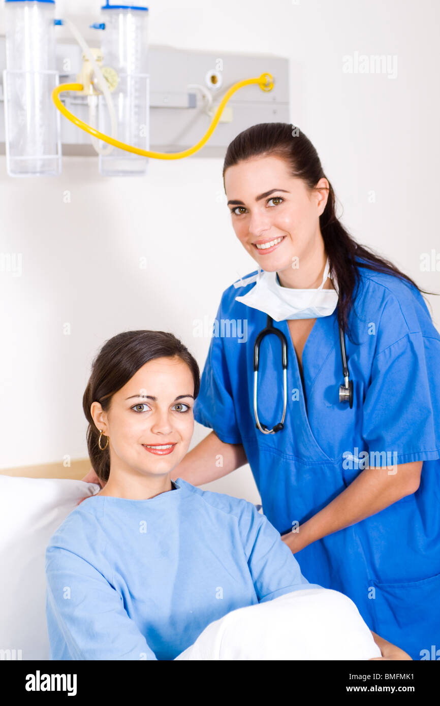 caring nurse helping patient in hospital ward Stock Photo - Alamy