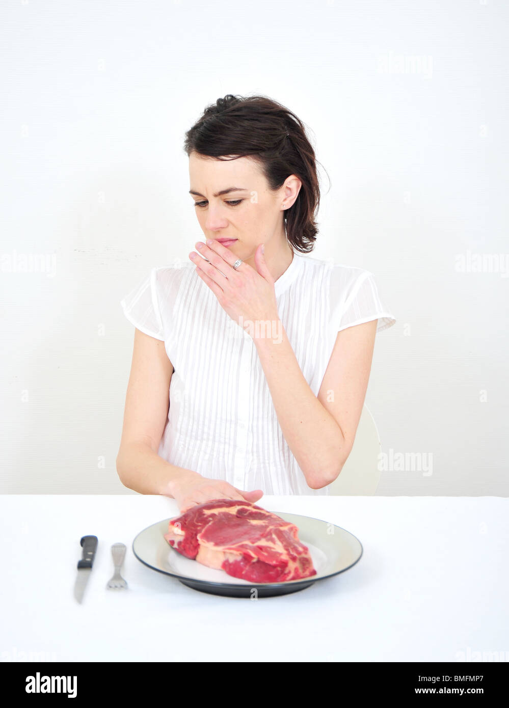 woman refusing a steak Stock Photo - Alamy