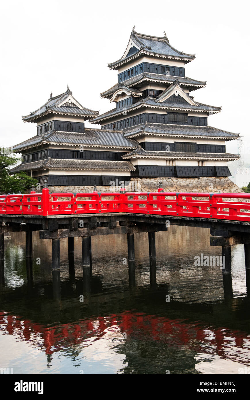 Matsumoto Castle with its famous red bridge crossing the moat in the ...