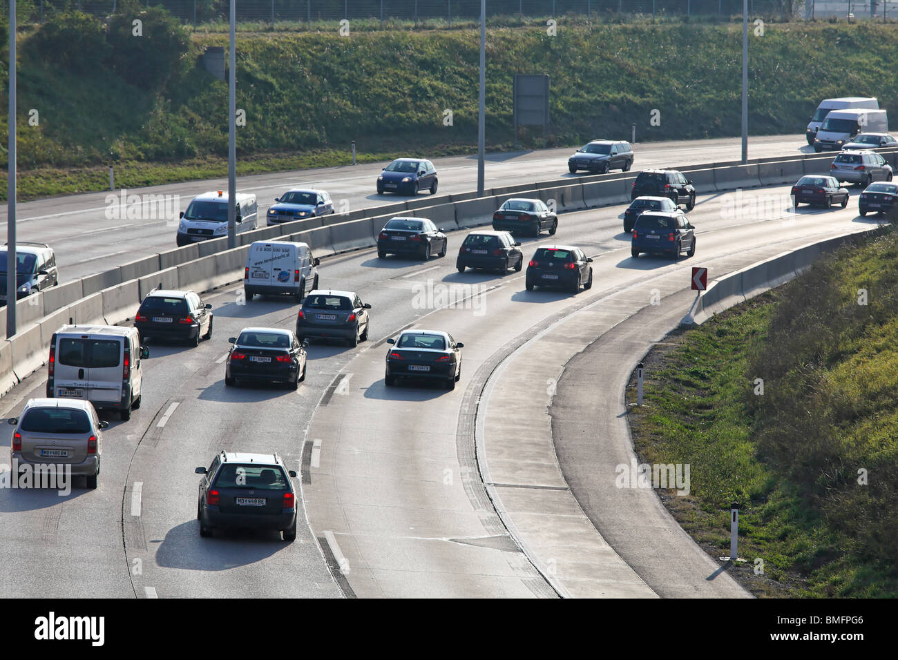 Cars drive on a highway Stock Photo - Alamy