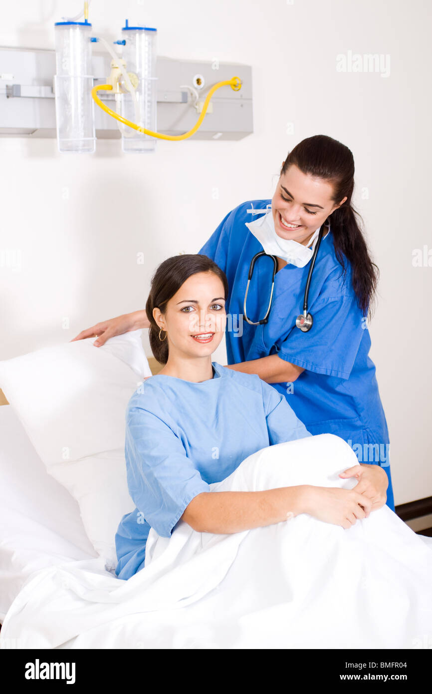 caring nurse helping patient in hospital ward Stock Photo - Alamy
