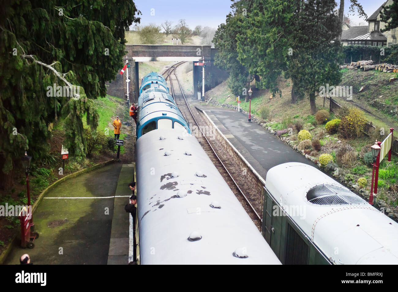 A station on a railway line in the countryside Stock Photo - Alamy