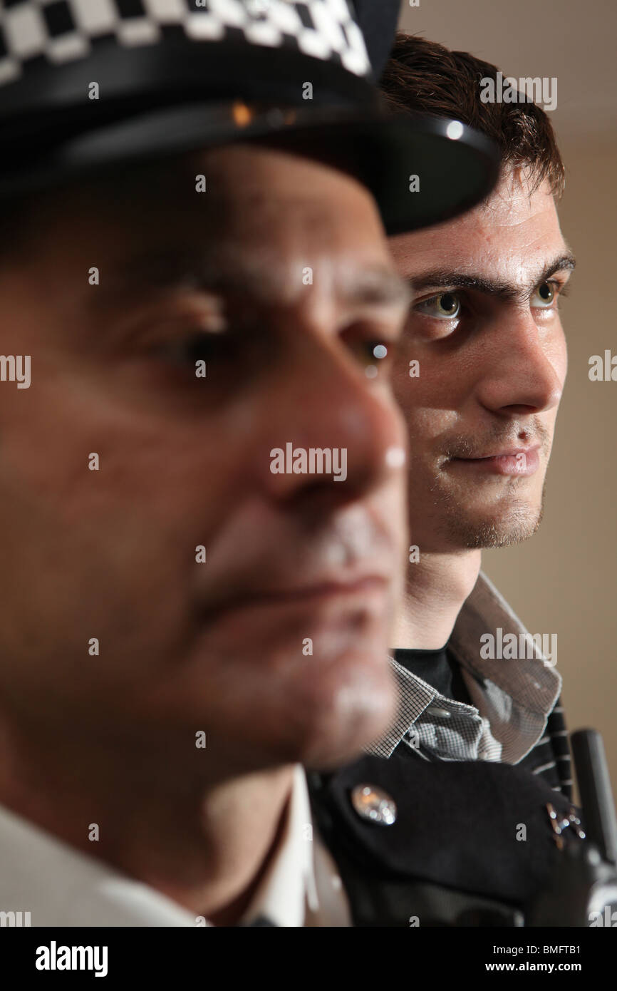 a portrait of a metropolitan police officer with a polish man stood ...