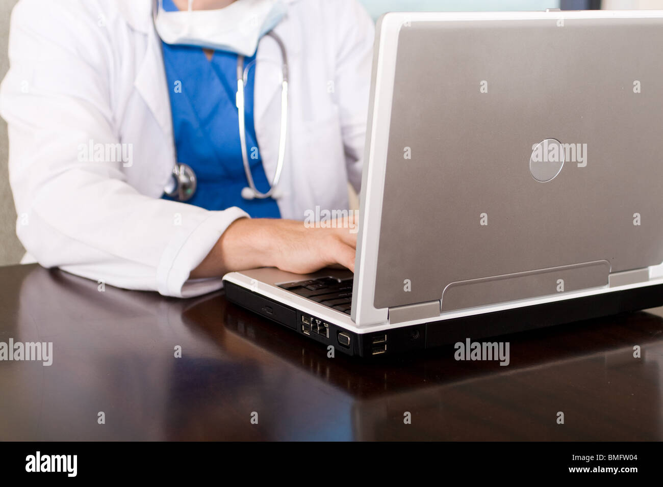 doctor using laptop in office Stock Photo - Alamy