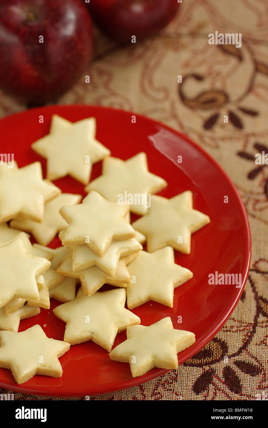 Star Shaped Cookies On A Red Plate Stock Photo - Alamy