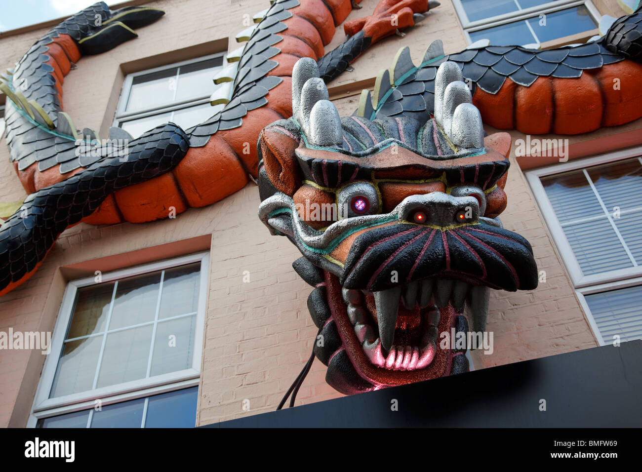 dragon on house front Stock Photo - Alamy