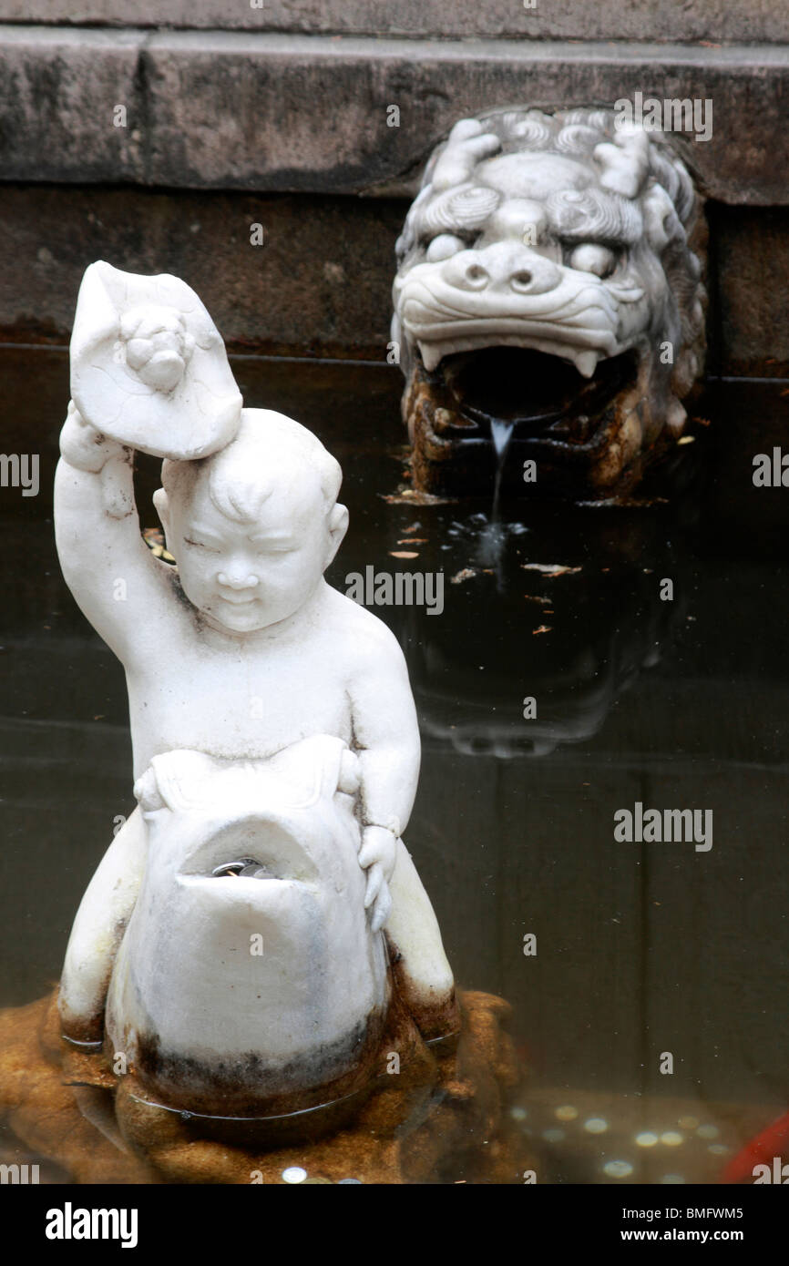 Close-up of statues in the pond, Dragon Spring Nunnery, Badachu Park ...