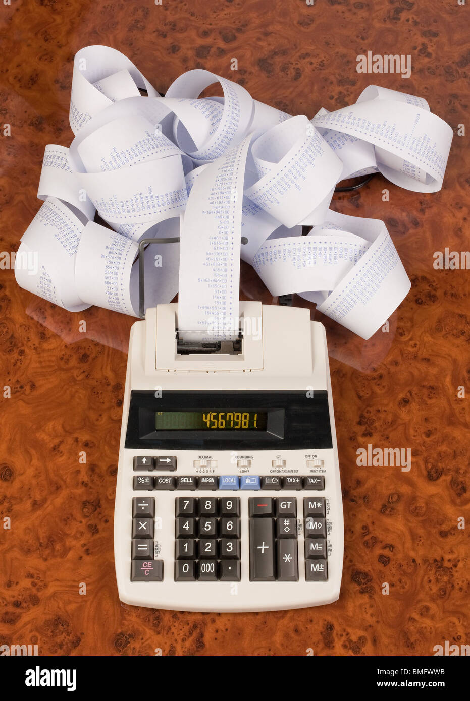 Desktop calculator with computer stripes. Symbol for costs, expenses ...