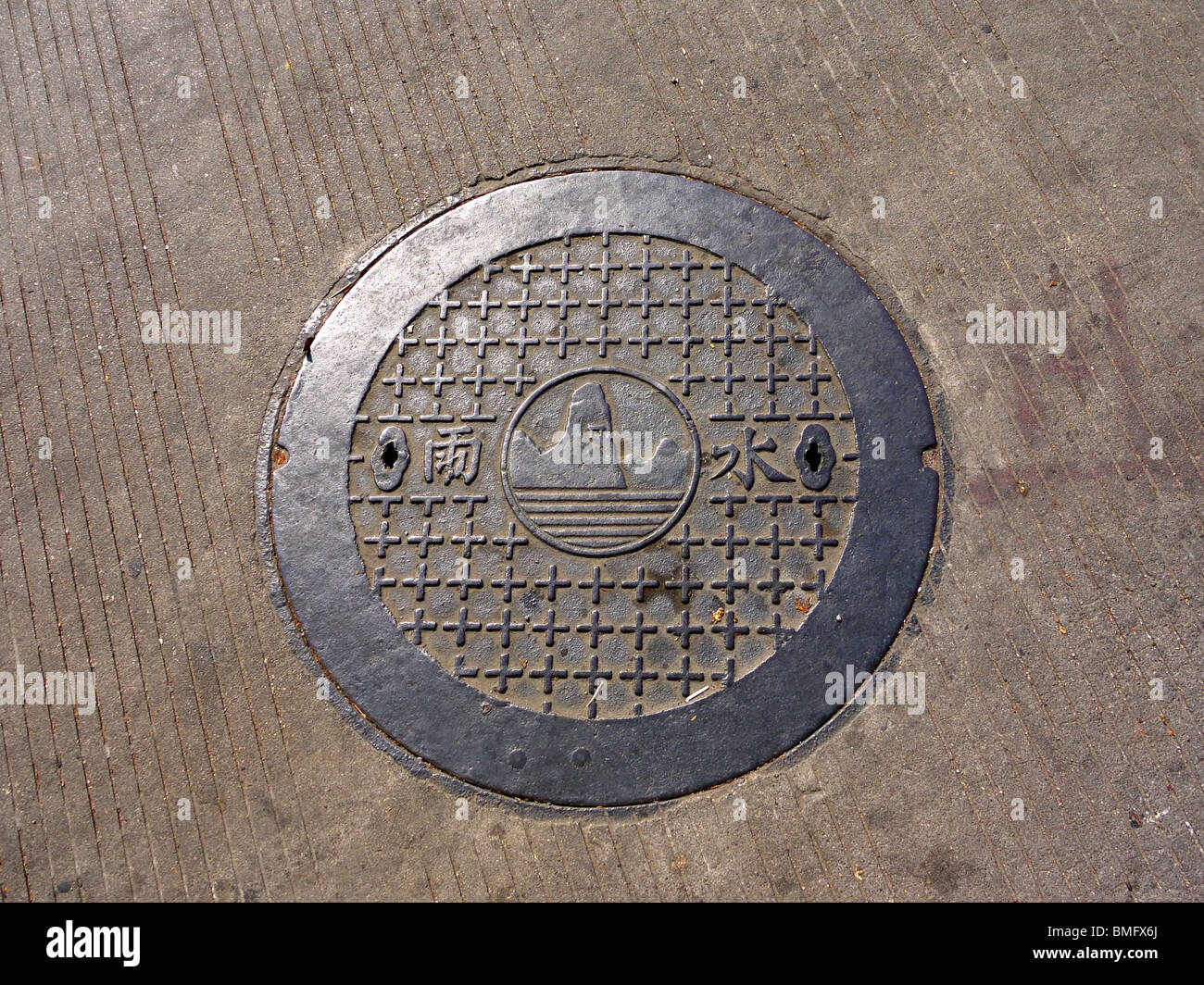 Sewer manhole in Guilin, China Stock Photo - Alamy
