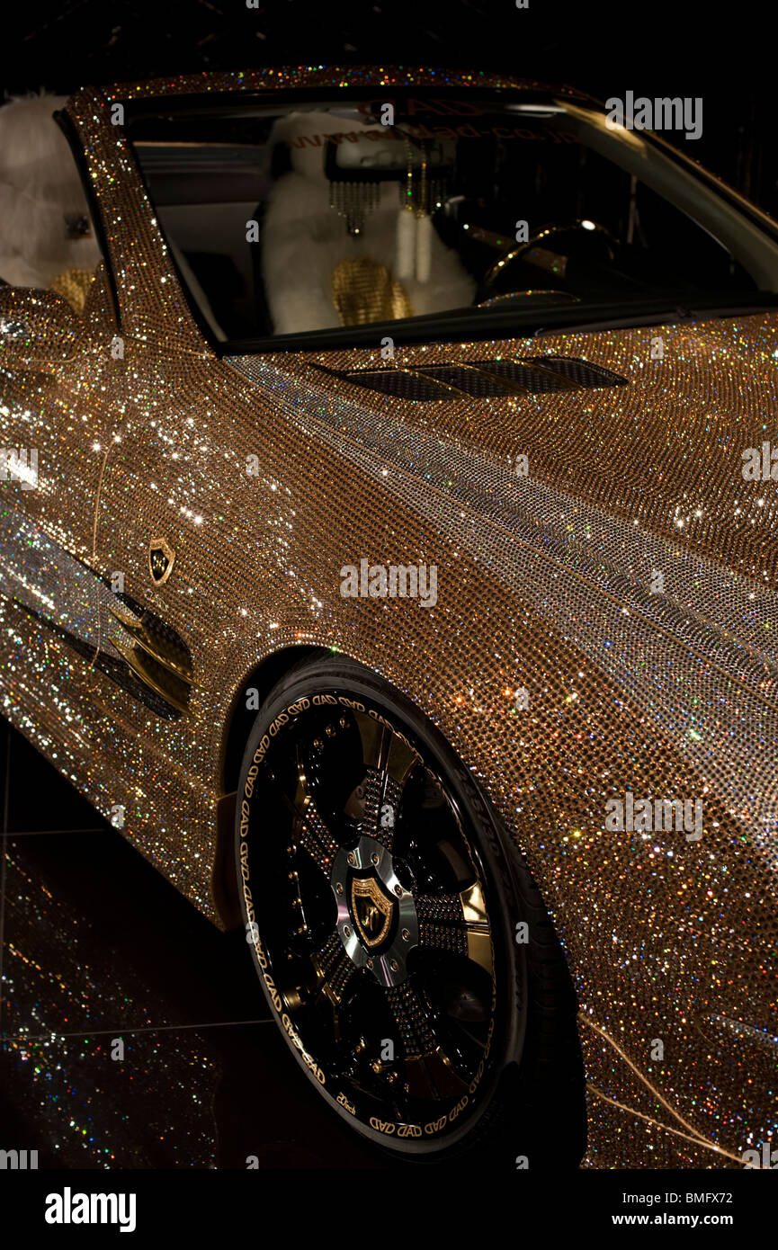 A car covered in sparkling Swarowski crystals in the D.A.D showroom in ...