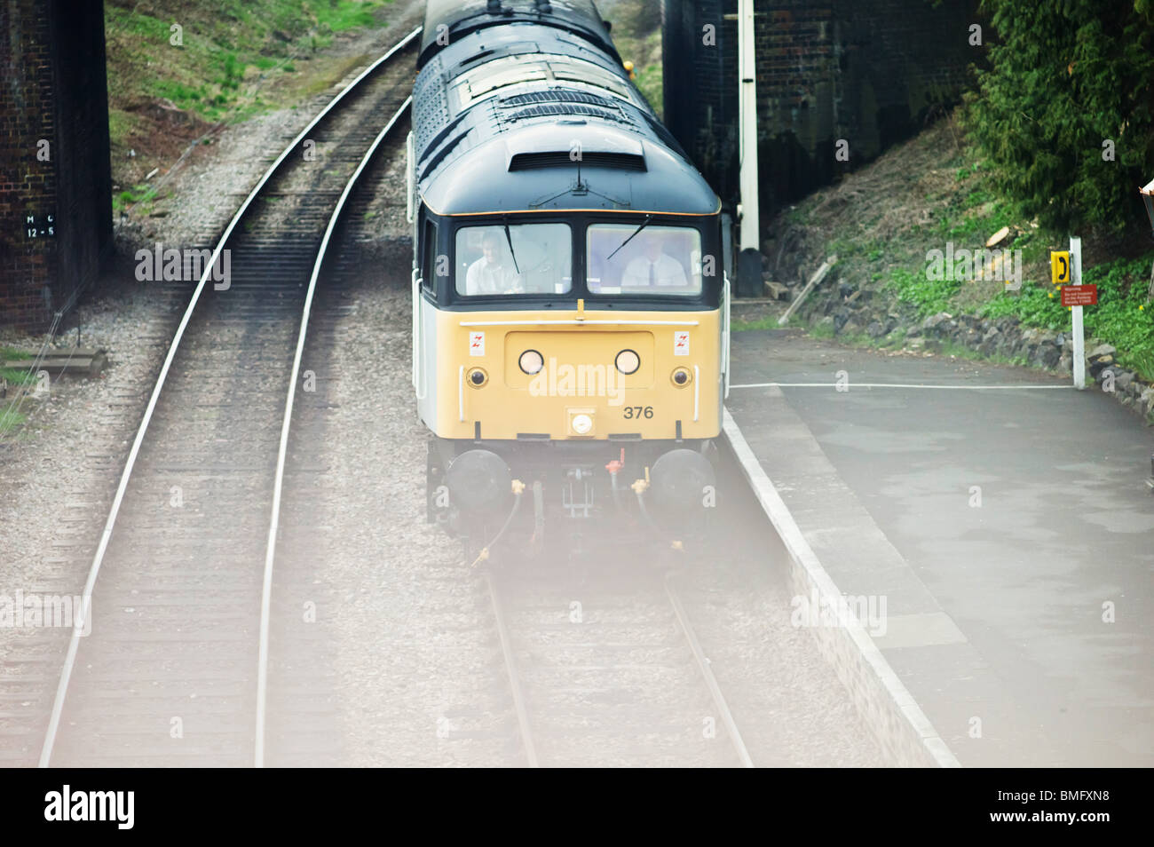 A station on a railway line in the countryside Stock Photo - Alamy