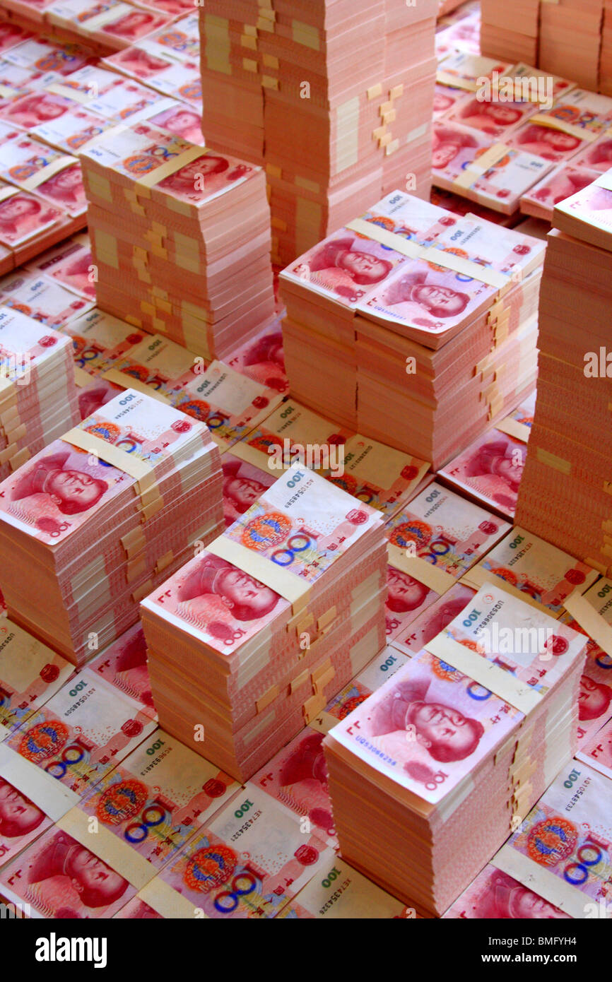Stacks of Chinese RMB bills with one hundred Yuan in face value ...
