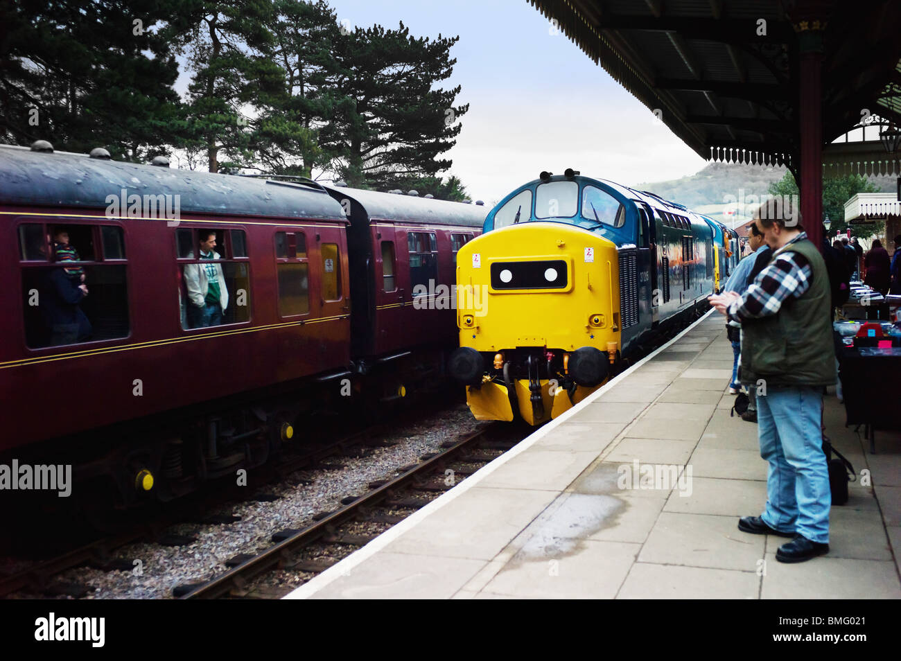 A station on a railway line in the countryside Stock Photo - Alamy