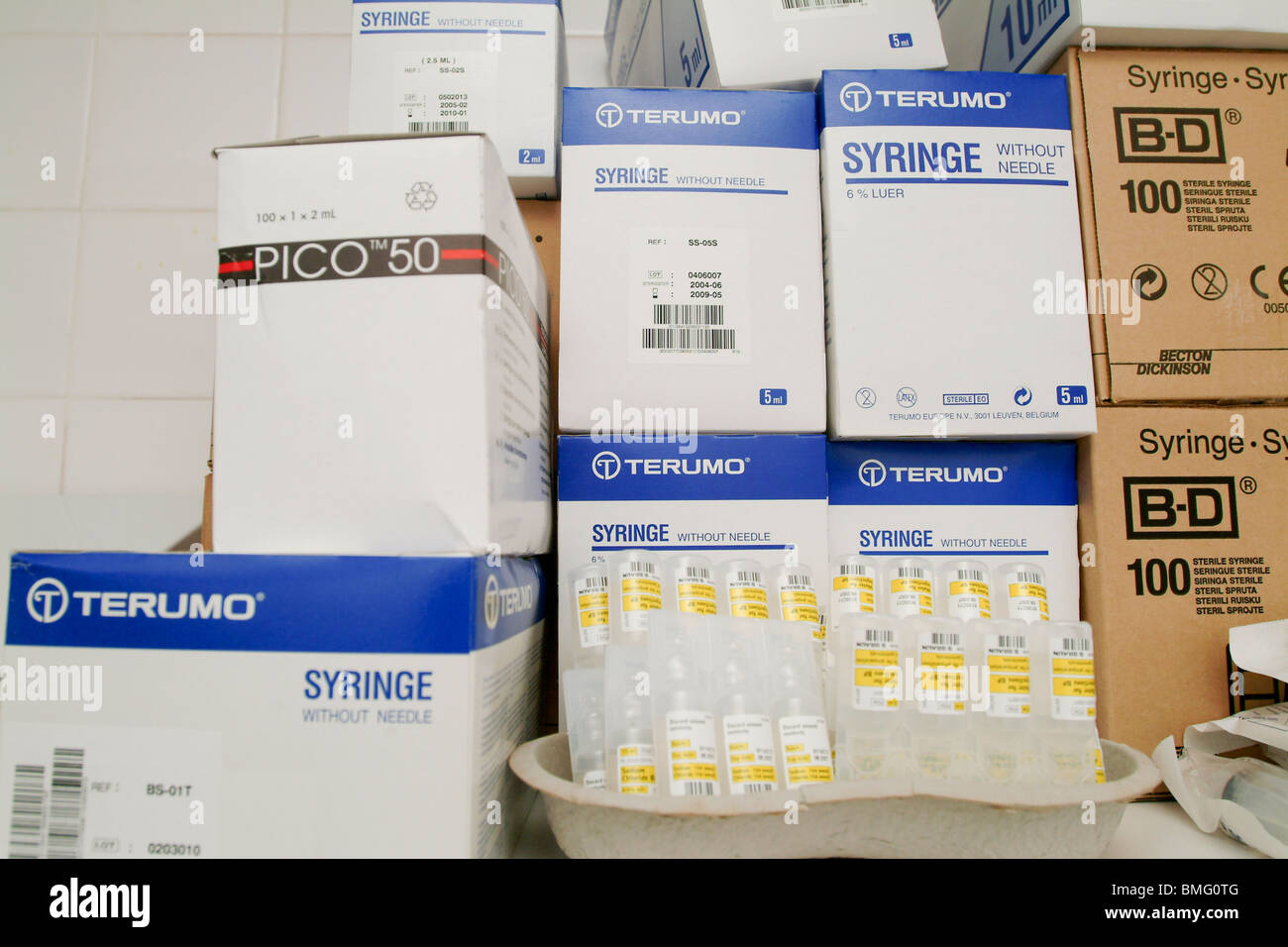 Syringe supplies in a hospital storage room UK Stock Photo - Alamy