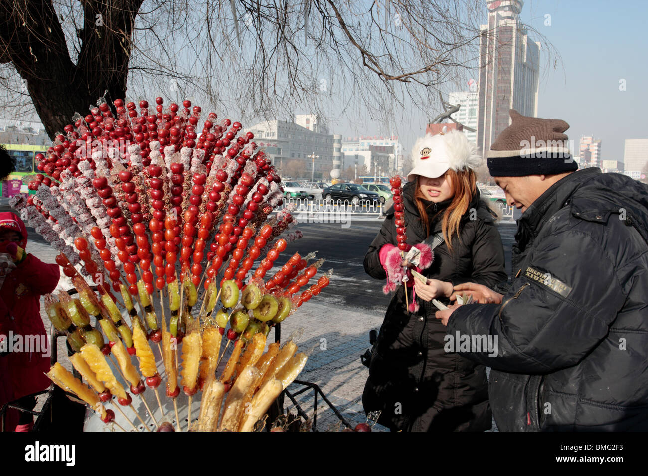 Street vendor selling traditional snack Tanghulu, Jilin, Jilin Province ...