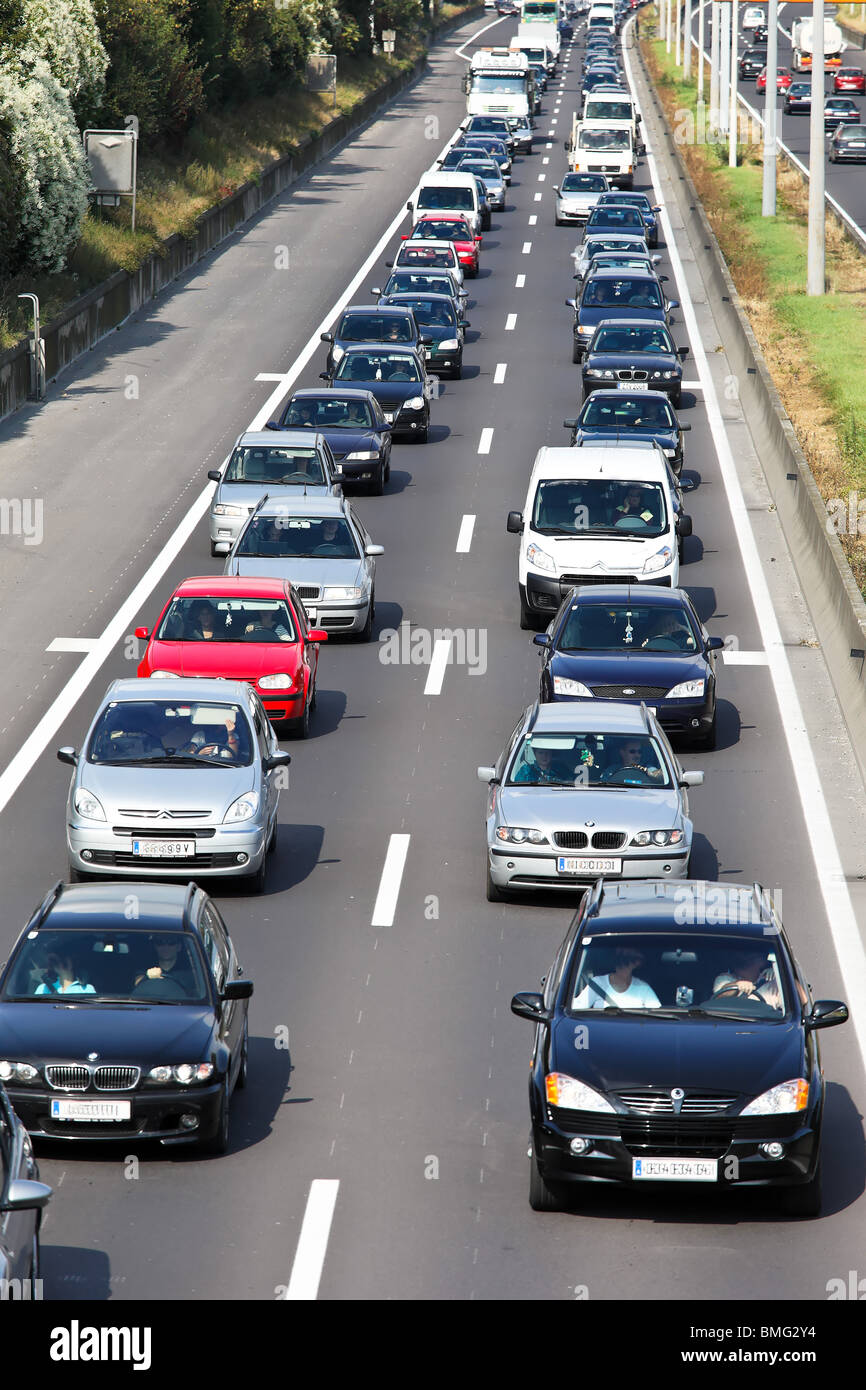 Traffic jam in the street with cars on a highway Stock Photo - Alamy