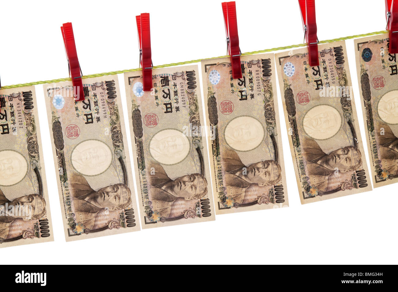 Symbol for money laundering with Japanese yen on clothesline Stock ...