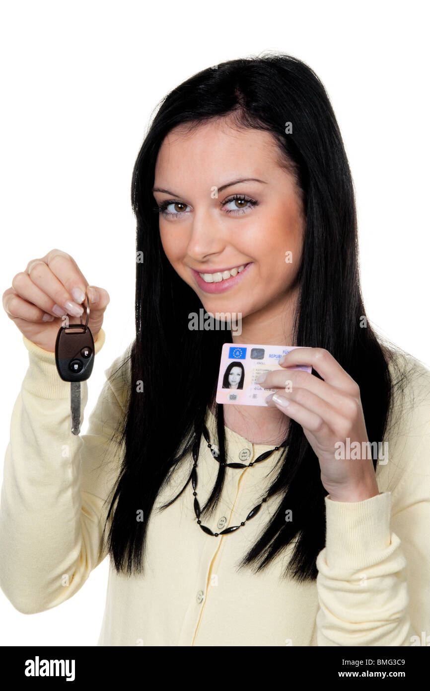 Woman with car keys and driver's license. Driving test Stock Photo - Alamy