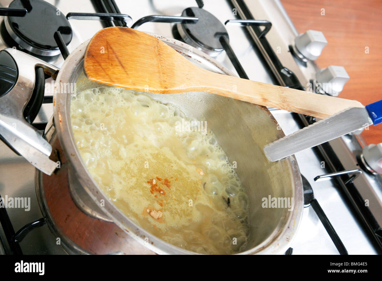 Cooking rice on the cooker Stock Photo - Alamy