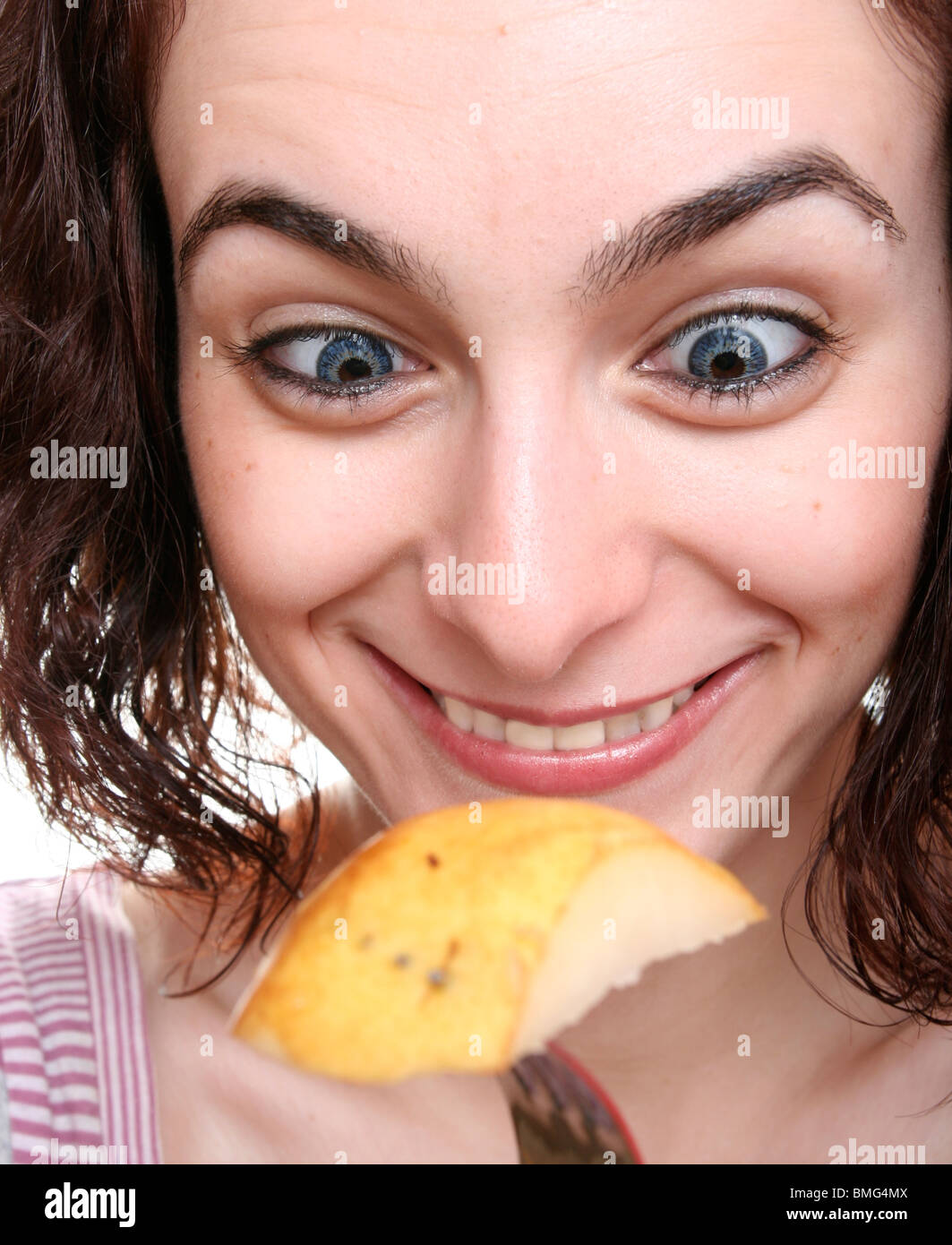 Pretty woman eating fruits fork hi-res stock photography and images - Alamy