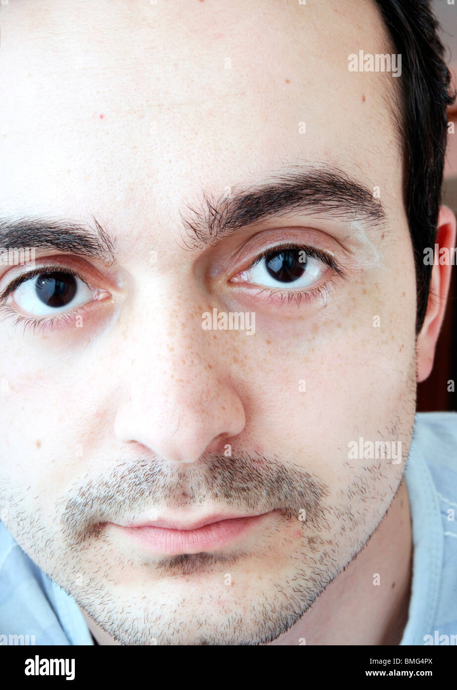 Young man face - close-up Stock Photo - Alamy