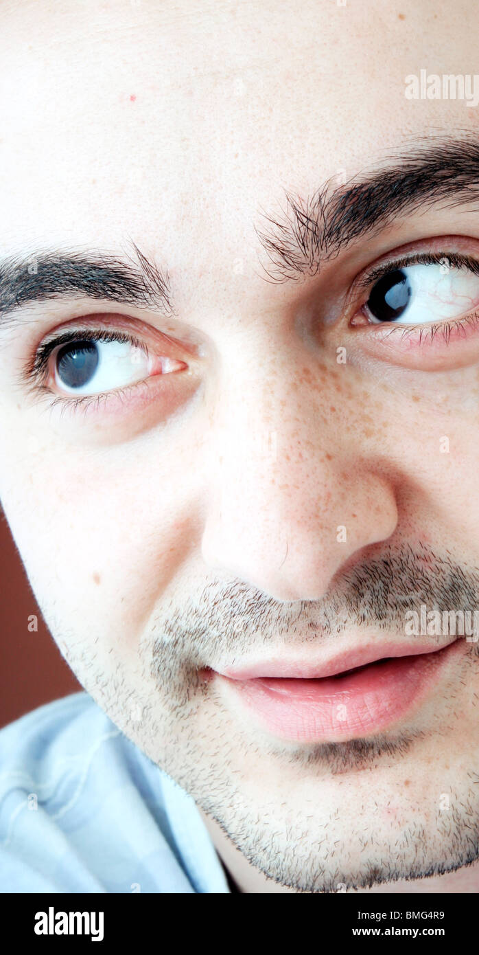 Young man face - close-up Stock Photo - Alamy